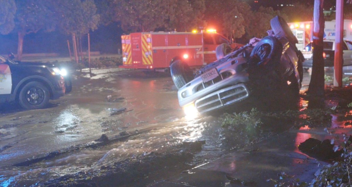 Vehicle Flips Over In Valencia Crash, Ruptures Fire Hydrant